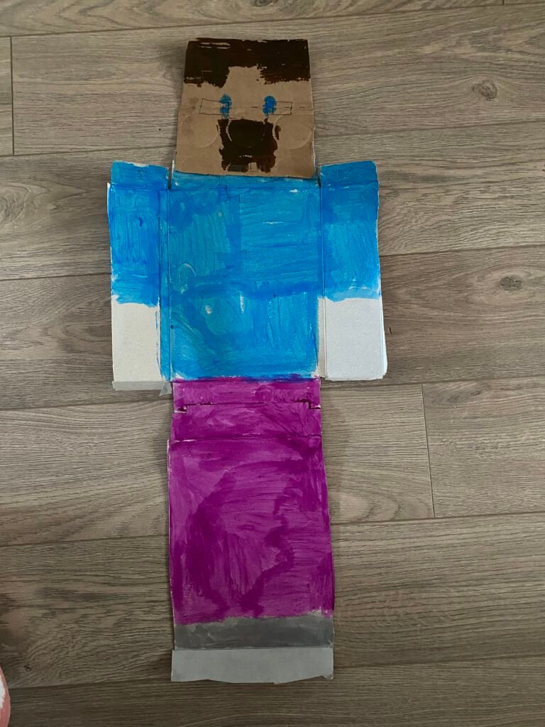 Steve from Minecraft created by Louie Littlewood age 6, using a cereal ...